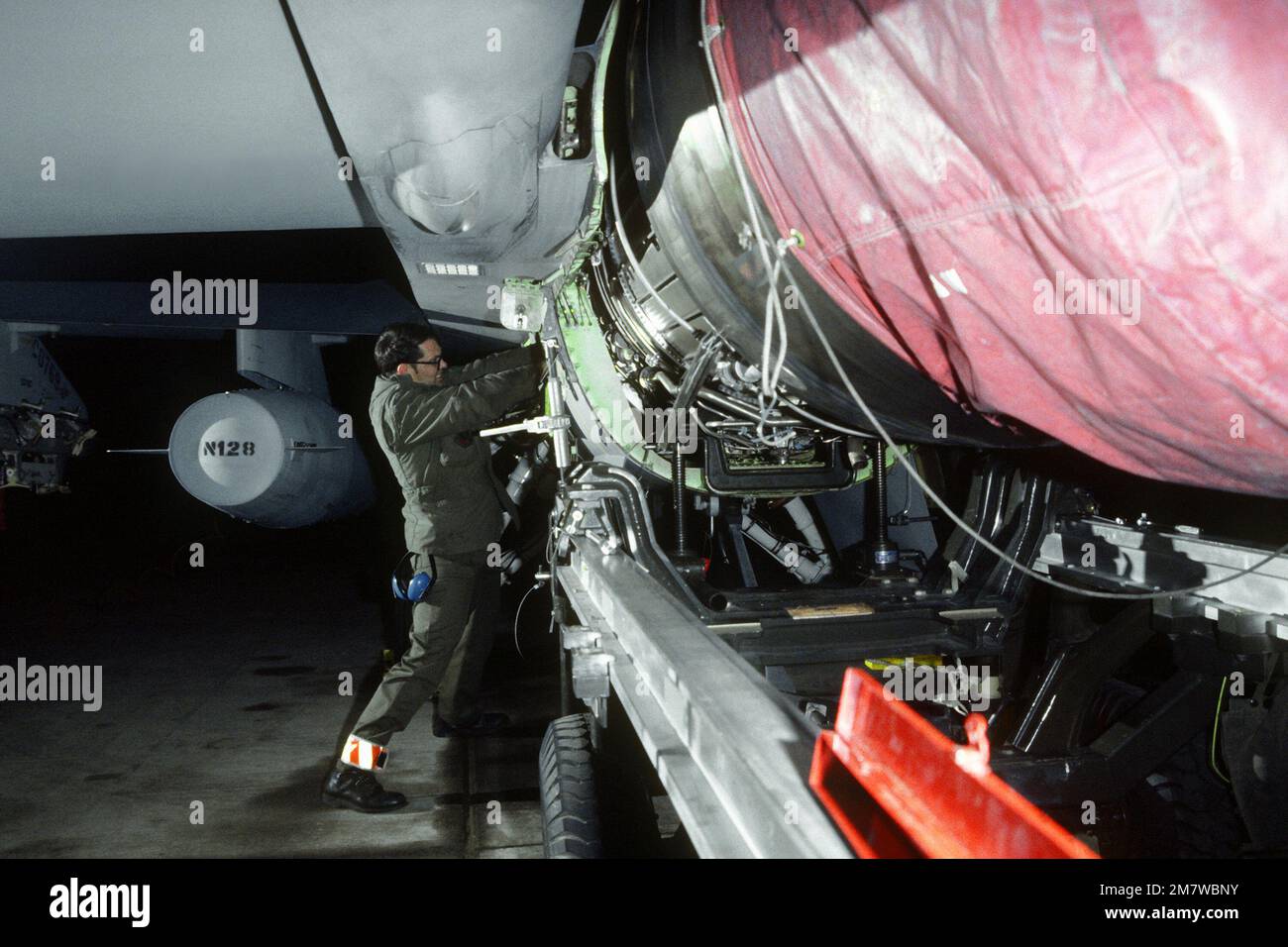 SSGT Richard an inspection of the Pratt and Whitney engine on an F-16 ...