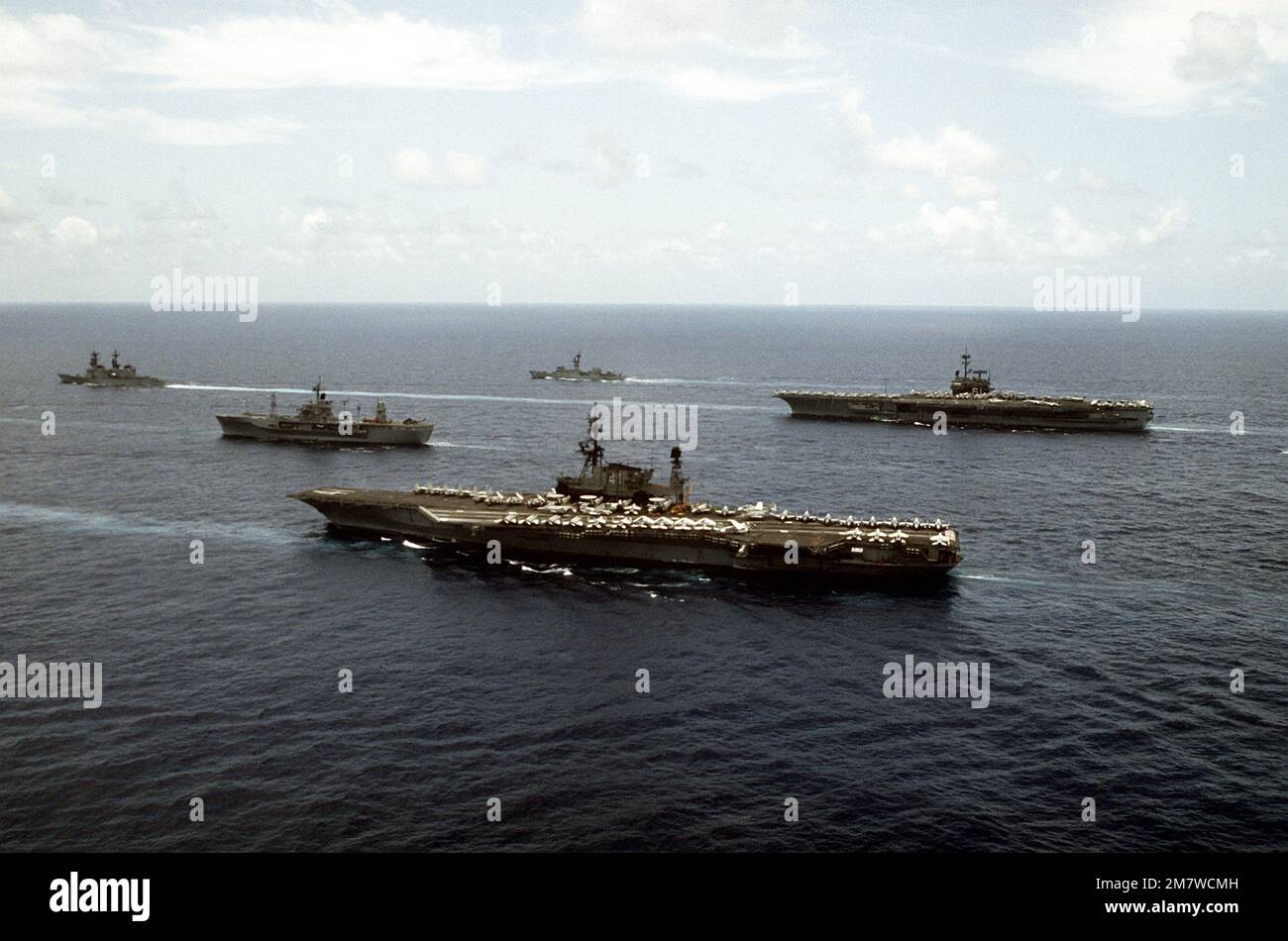 A port beam view of ships from the battle groups of the aircraft ...