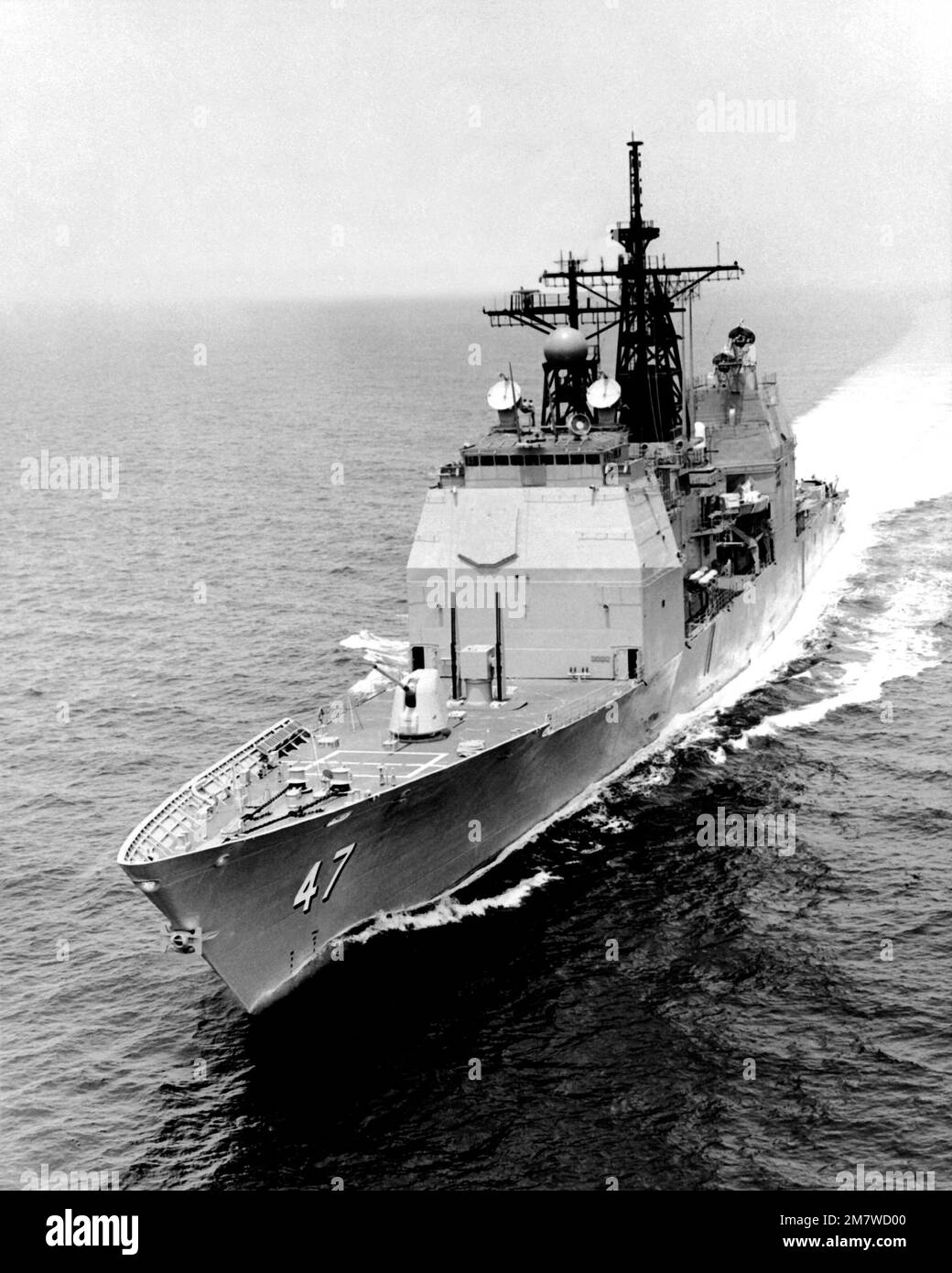 An aerial port bow view of the guided missile cruiser TICONDEROGA (CG ...