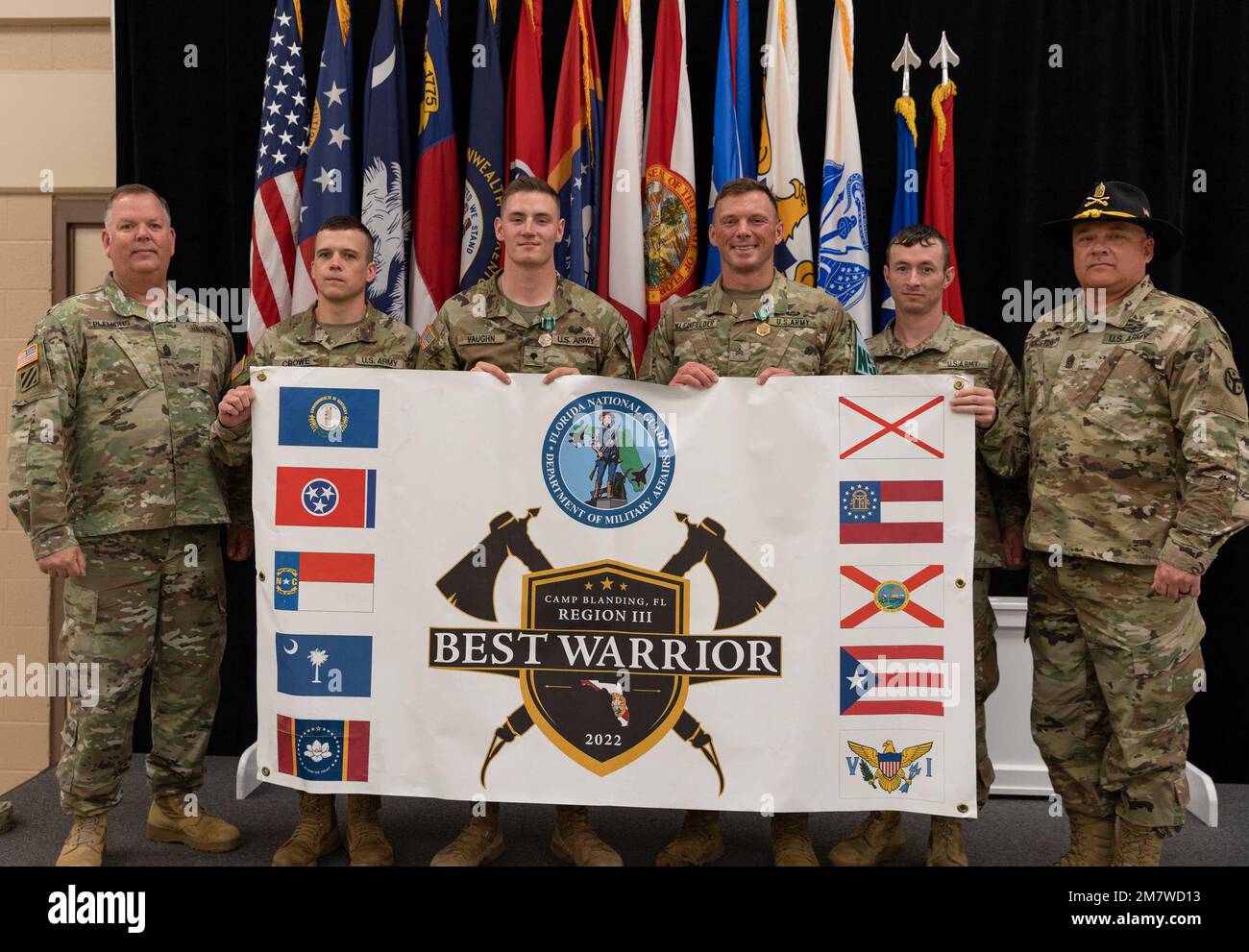 Spc. Grayson Vaughn (center left) and Sgt. Zachary Kleinfelder (center ...