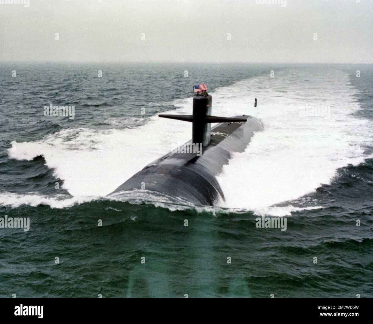 An aerial port bow view of the nuclear-powered attack submarine USS LA ...
