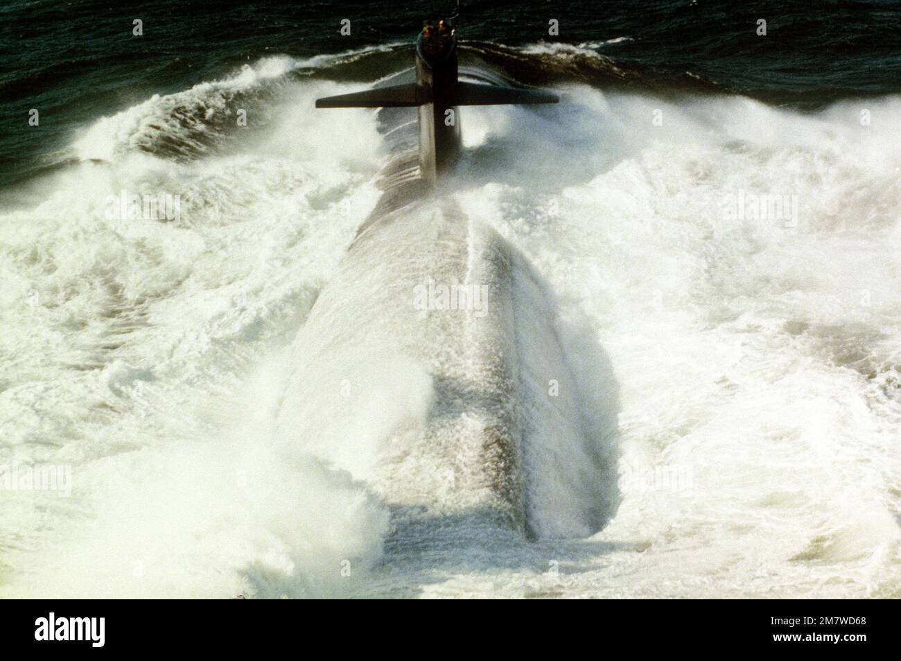 An aerial stern view of the nuclear-powered attack submarine USS ...