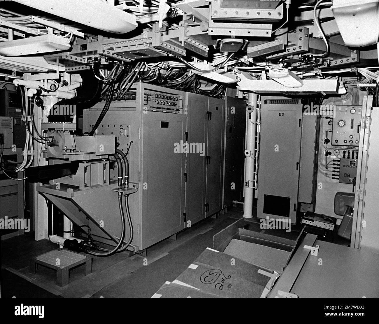 An interior view of the combat information center on the guided missile ...