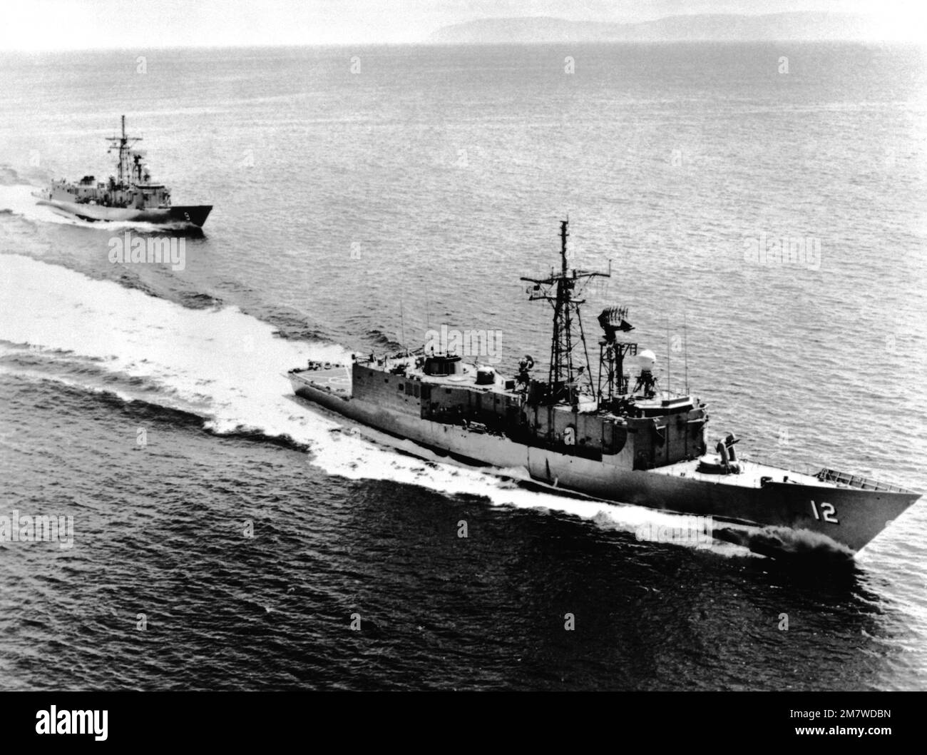 An aerial starboard bow view of the guided missile frigate USS GEORGE ...