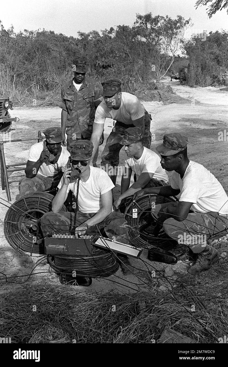 Marines use their radios to contact their base camp during Operation ...