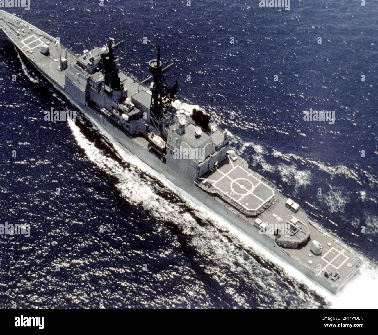 An aerial port quarter view of the Aegis guided missile cruiser ...
