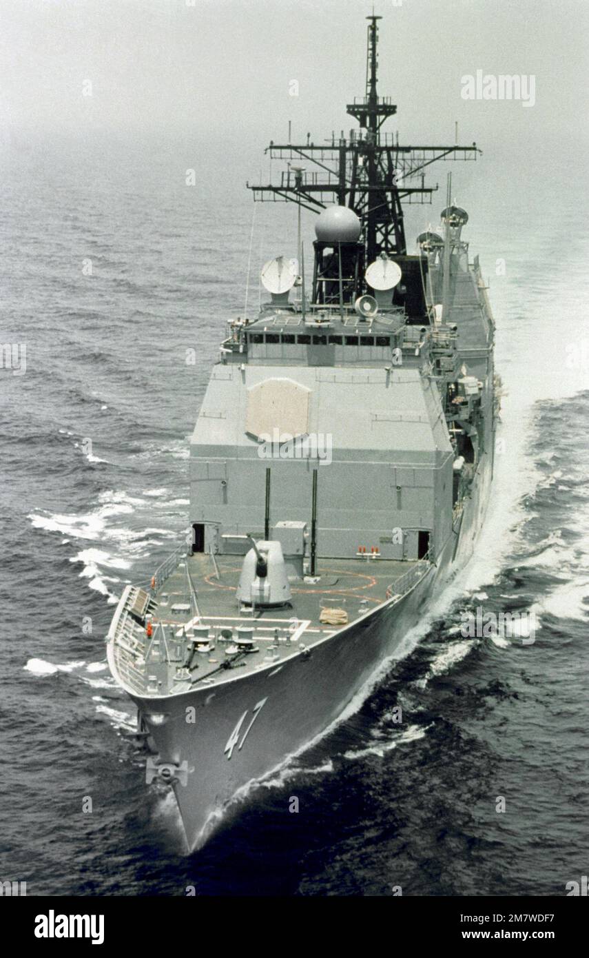 Aerial port bow view of the Aegis guided missile cruiser TICONDEROGA ...