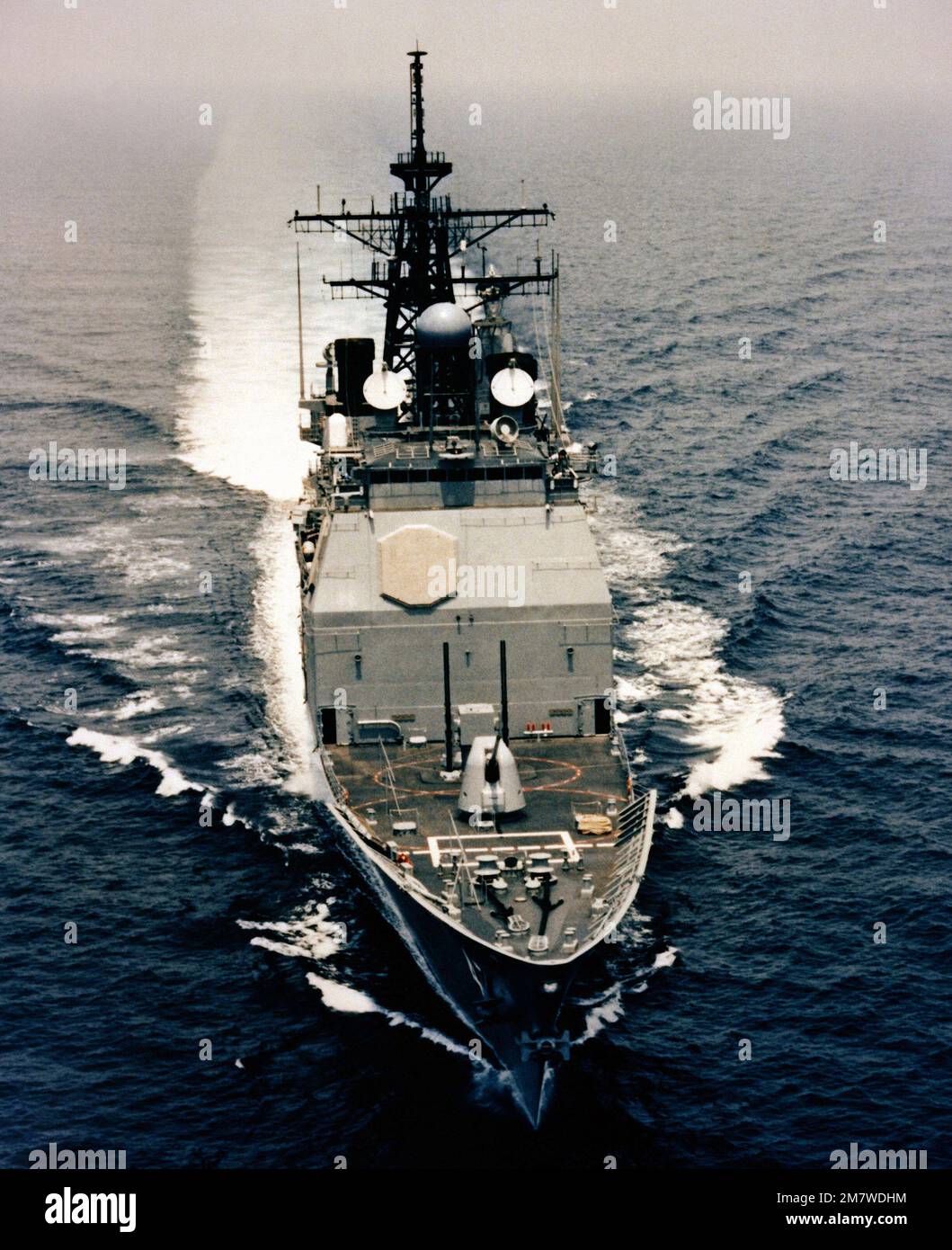An aerial bow view of the Aegis guided missile cruiser USS TICONDEROGA ...