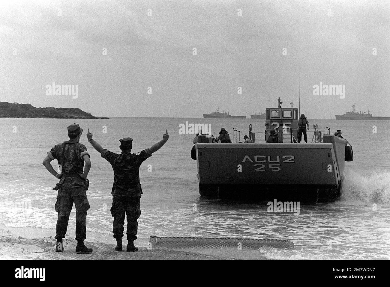 Marines from the Fourth Marine Amphibious Brigade direct an LCM-8 ...