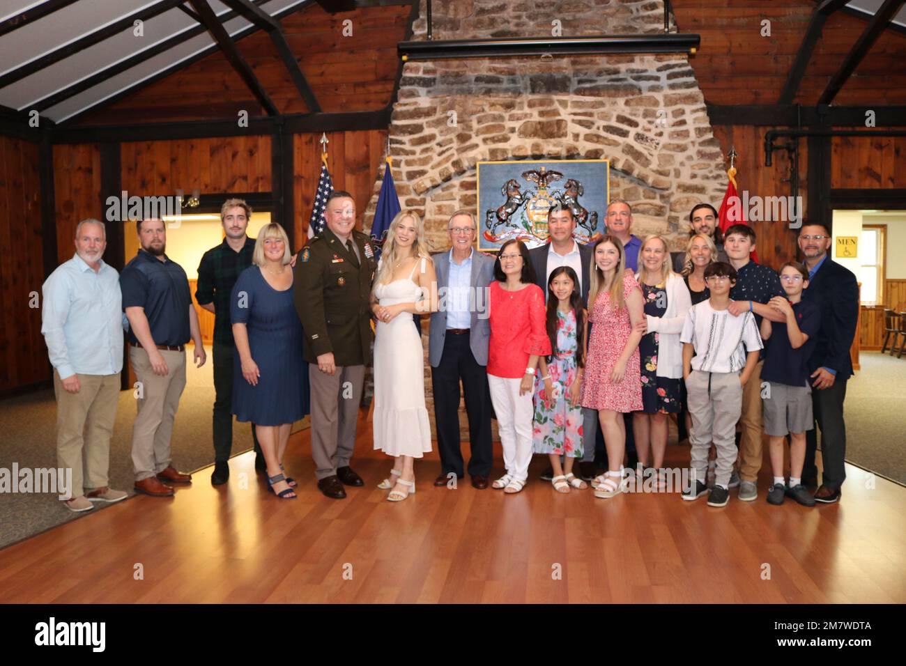 Brig. Gen. John Pippy stand with his family and friends after being ...