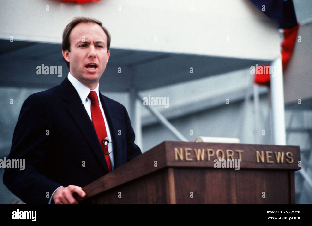 A guest speaker addresses the crowd attending the launching ceremony ...
