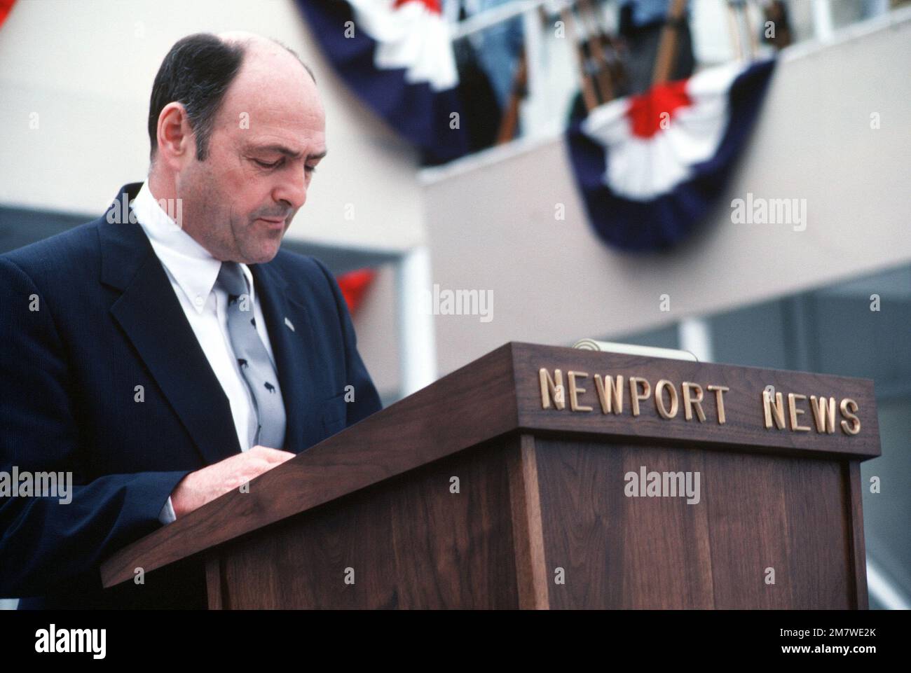 A guest speaker addresses the people attending the launching ceremony ...