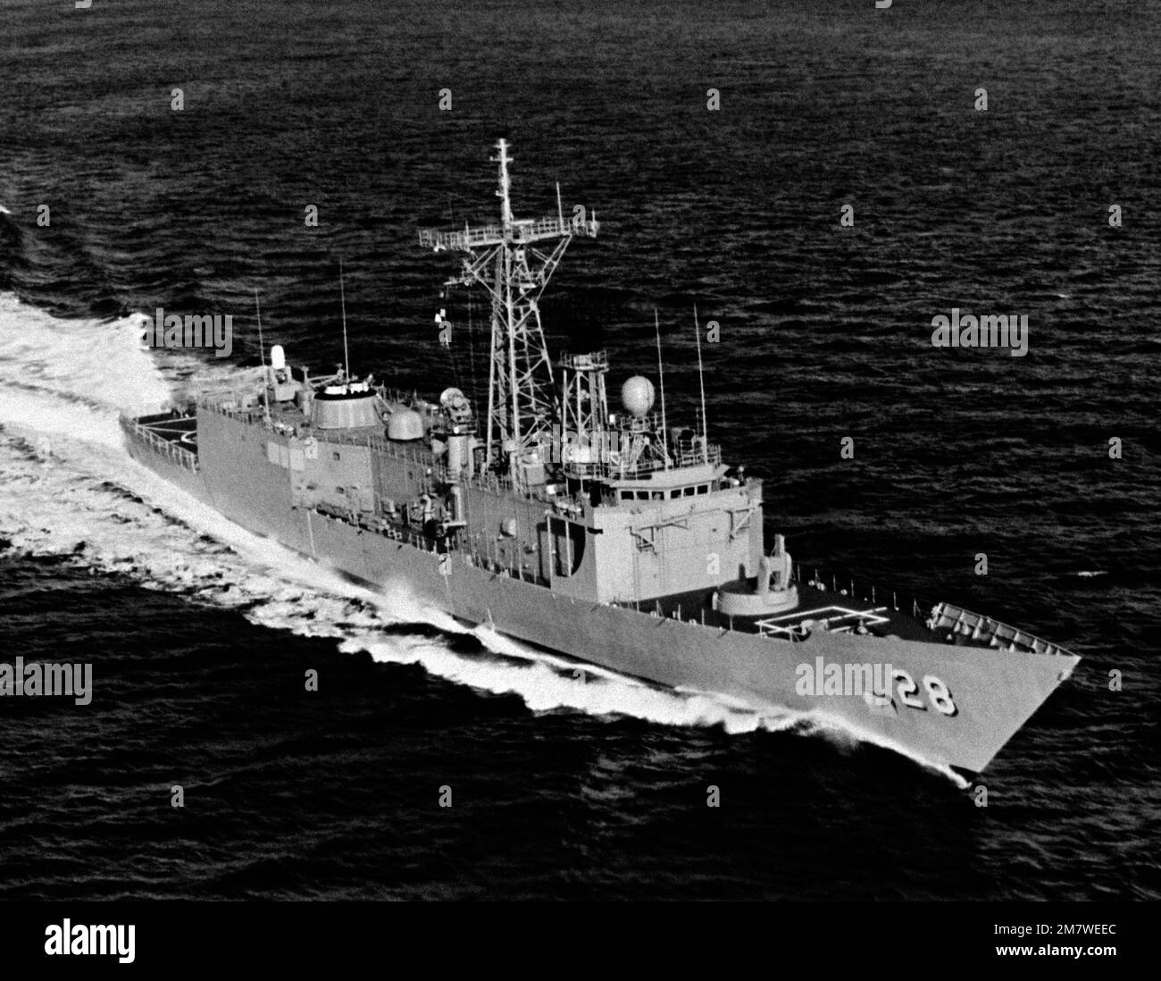 An aerial starboard bow view of the guided missile frigate USS BOONE ...
