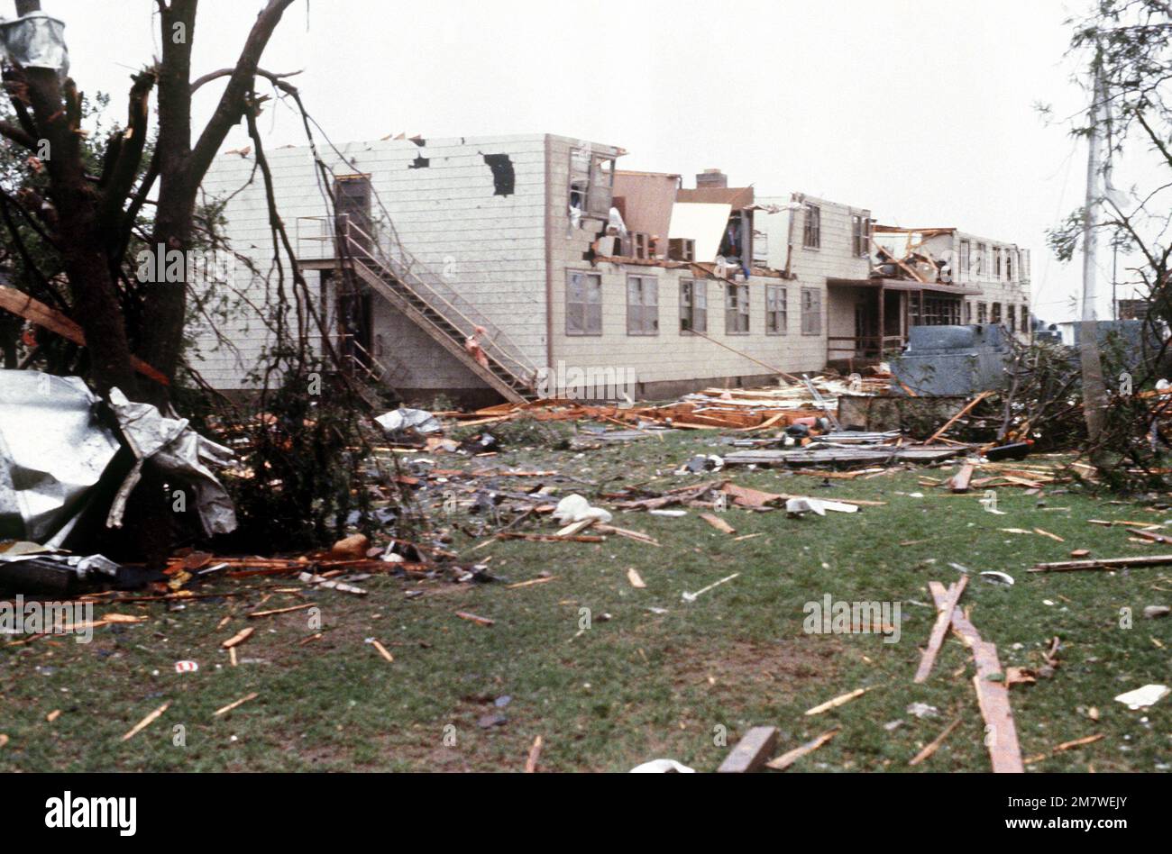 A view of the damage done to the Airmen's dormitories after a tornado struck the base. Base ...