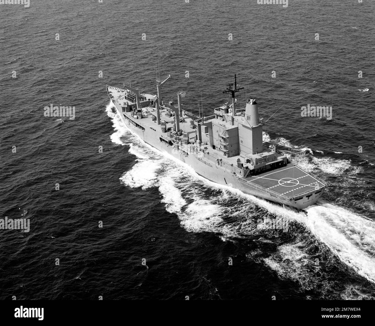 A port quarter view of the fleet oiler USS WILLAMETTE (AO-180) underway ...