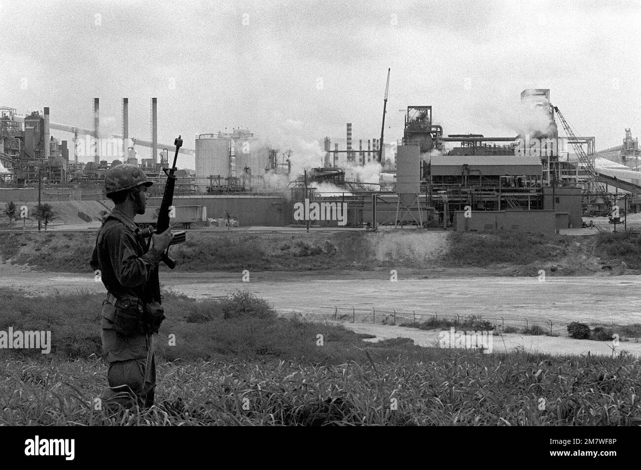 A Puerto Rican National Guardsmen, carrying an M-16A1 rifle, stands ...