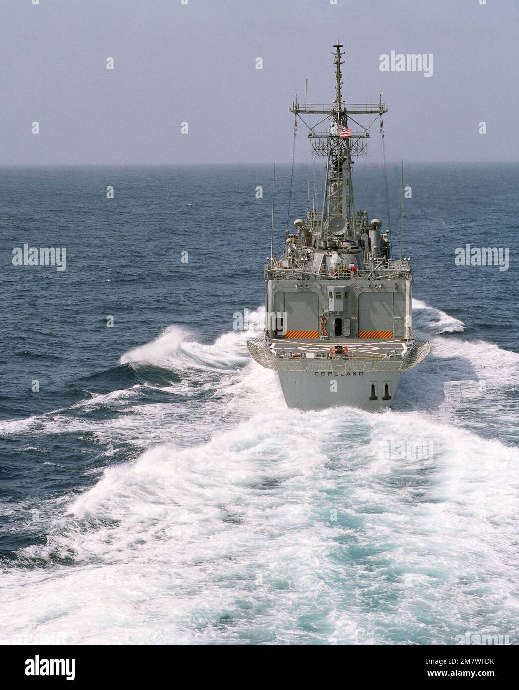 Aerial stern view of the guided missile frigate COPELAND (FFG 25 ...