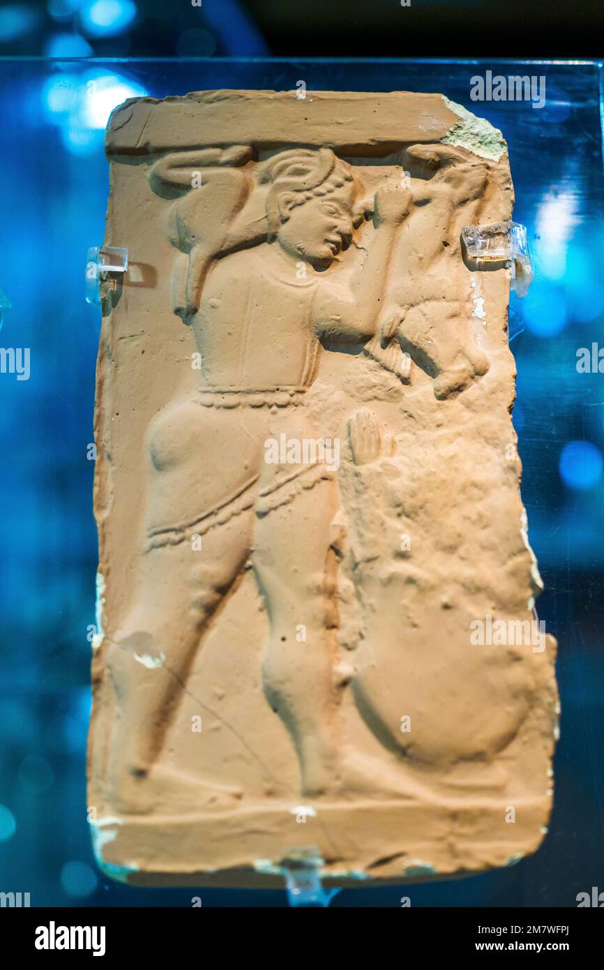 Relief tablet (pinakes) with the figure of Heracles leading the ...