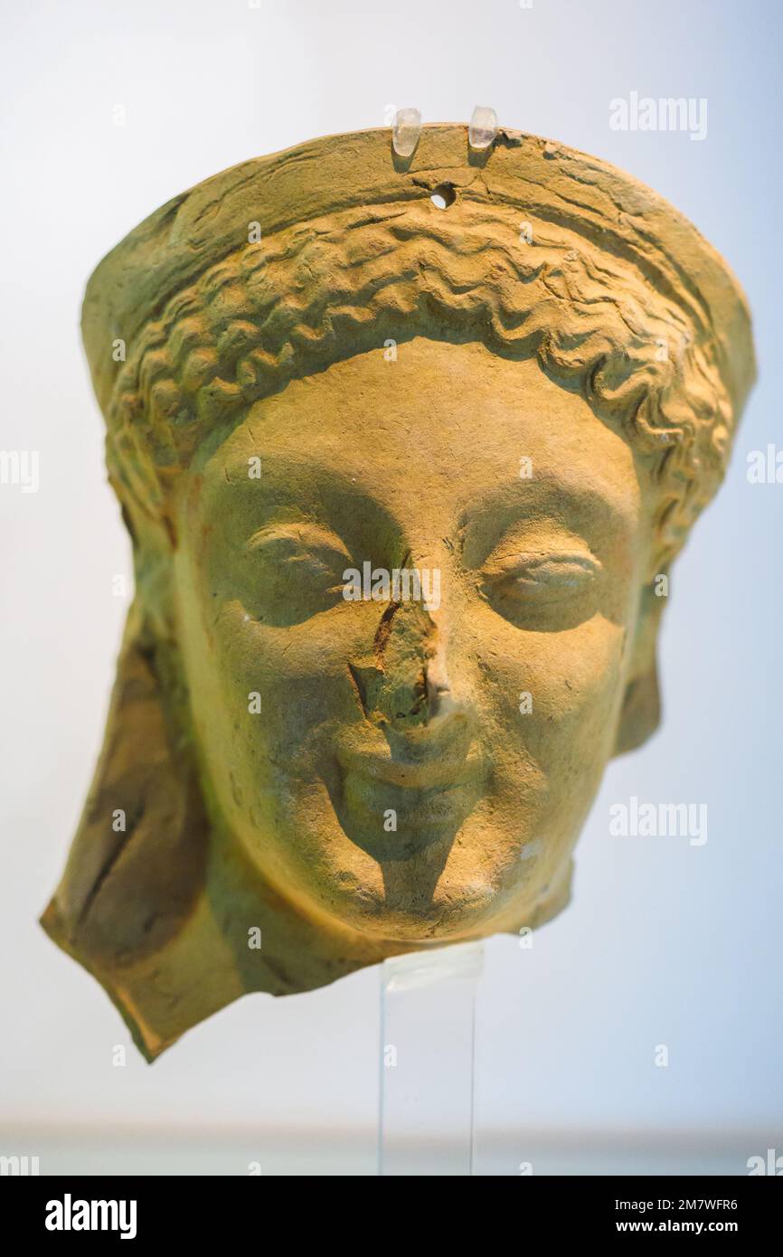 Archaic statuette of a seated goddess (Demeter). It is likely that as ...