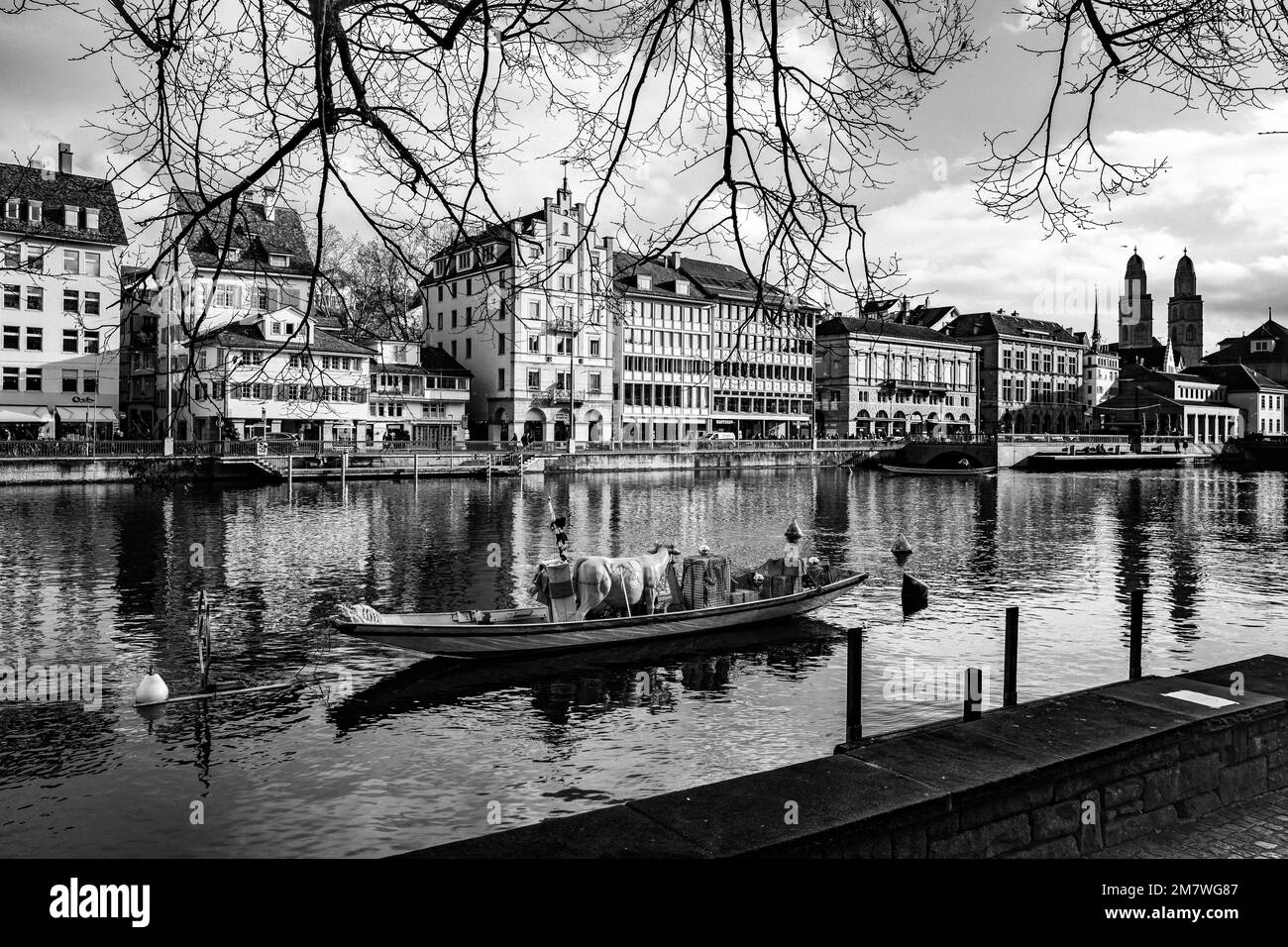 An aerial view of cityscape Zurich surrounded by buildings and water ...