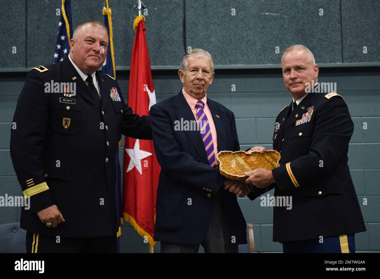 U.S. Army Chief Warrant Officer 5 (Retired) William Buck receives a ...