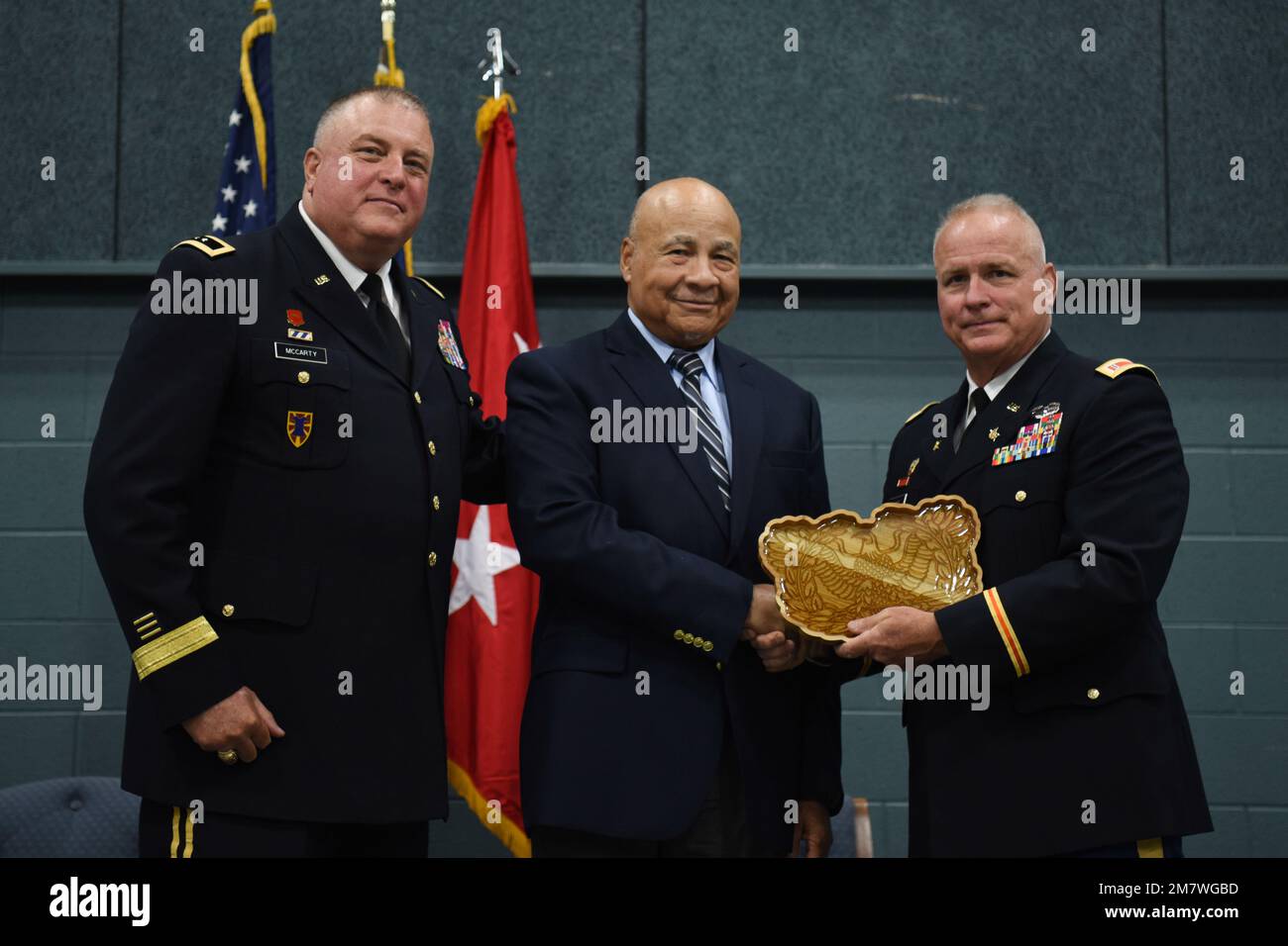 U.S. Army Chief Warrant Officer 5 (Retired) Charles Johnson receives a ...