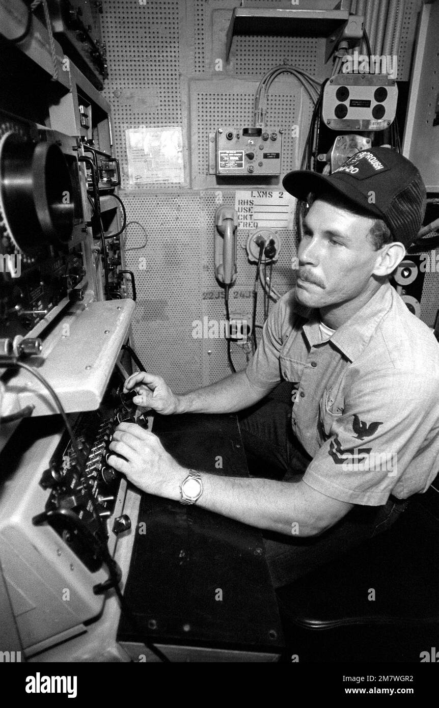 Electronics Warfare Technician 2nd Class Scott Chapin operates sonar ...