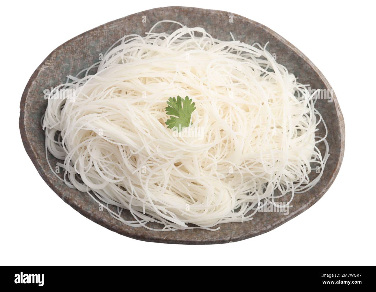 Raw white vermicelli on a white background Stock Photo - Alamy