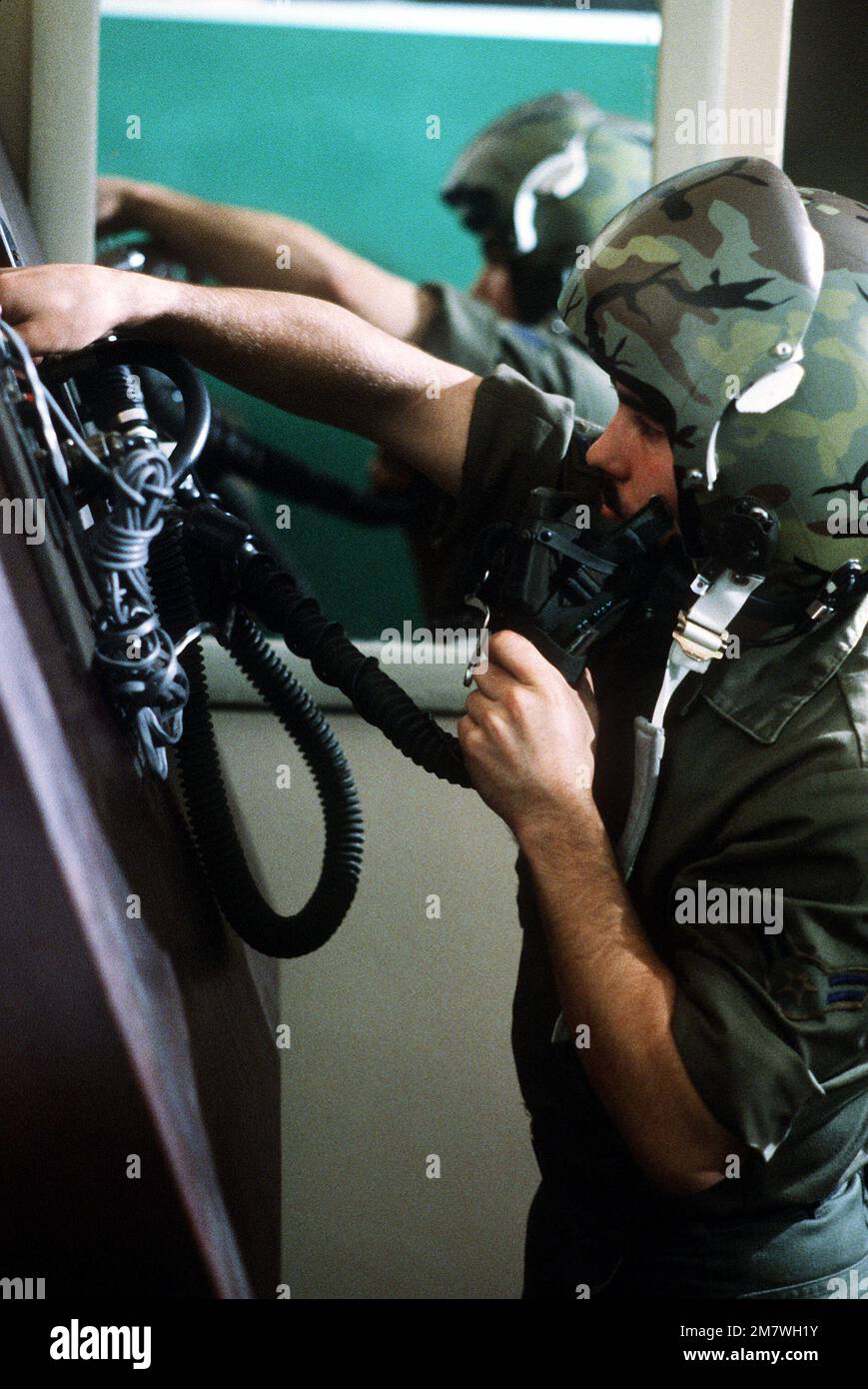 AIRMAN 1ST Class Augusto Angel checks the oxygen flow and the intercom ...