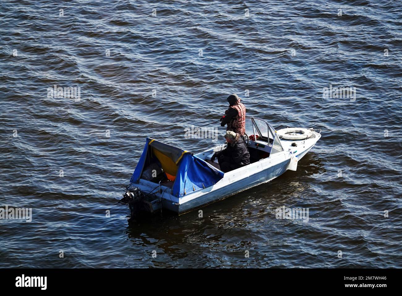 Fisherman catching big fish from boat hi-res stock photography and ...