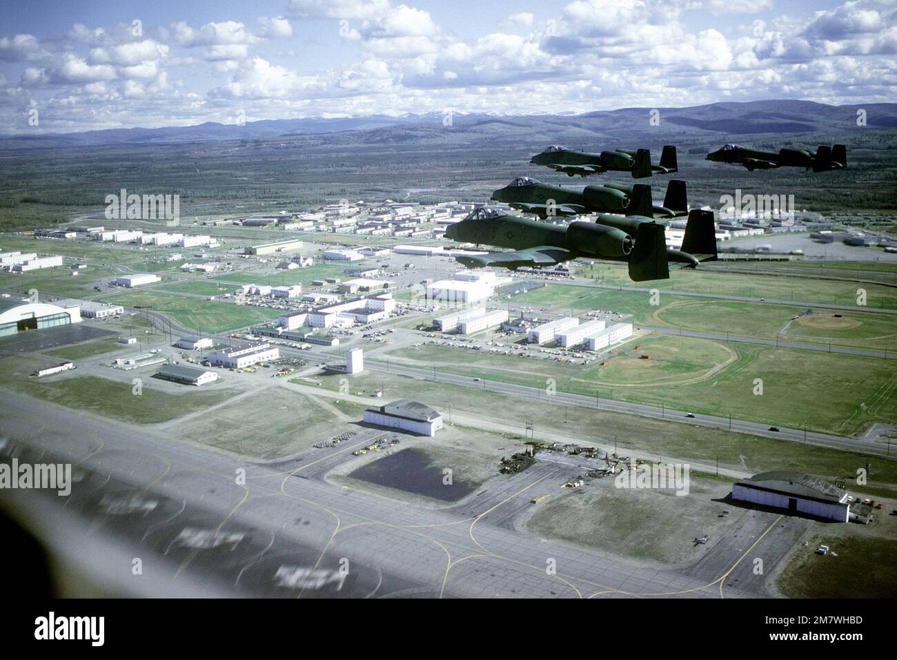 A view of a four-ship wedge formation of A-10 Thunderbolt II aircraft ...