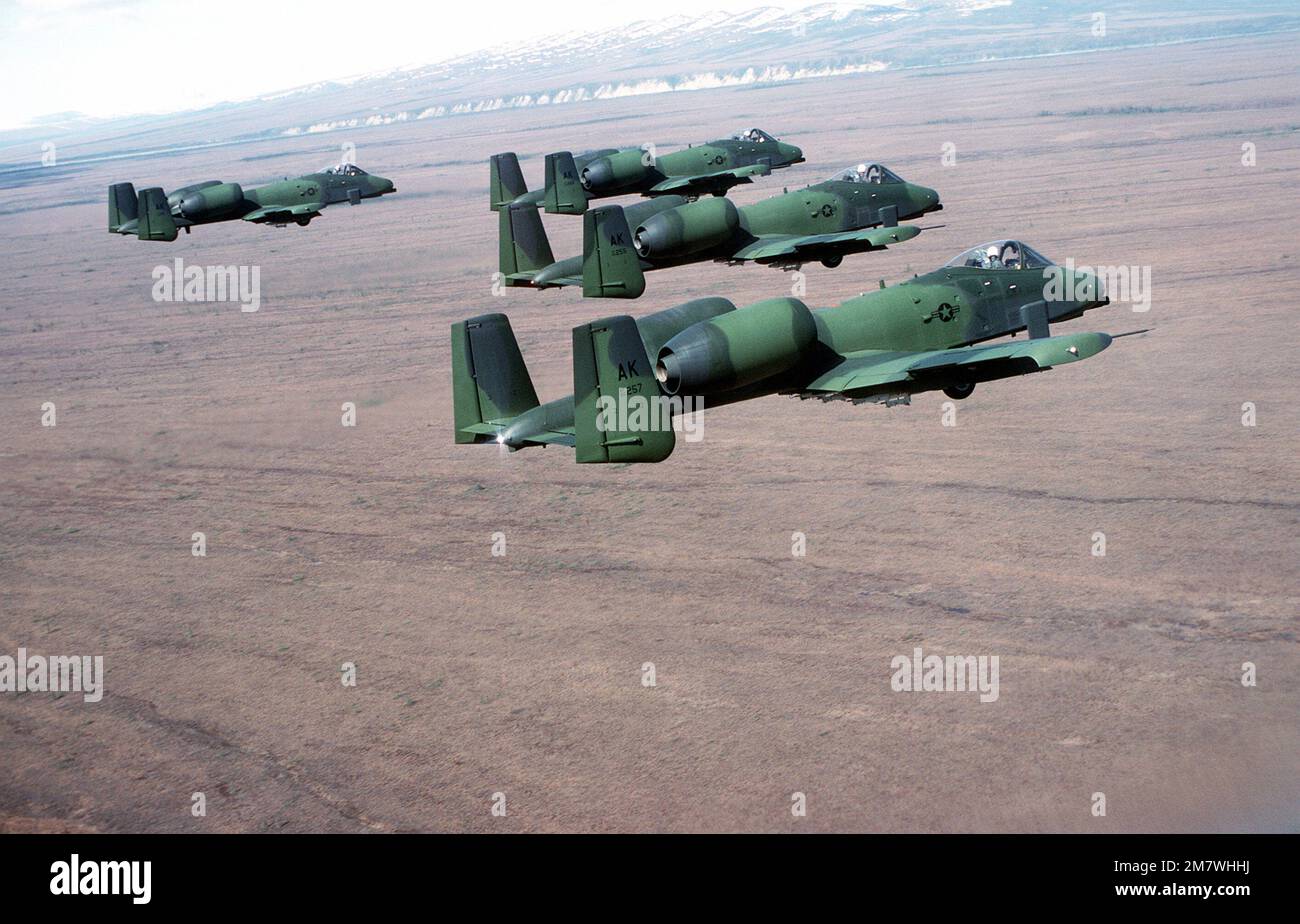A view of four-ship wedge formation of A-10 Thunderbolt II aircraft in ...