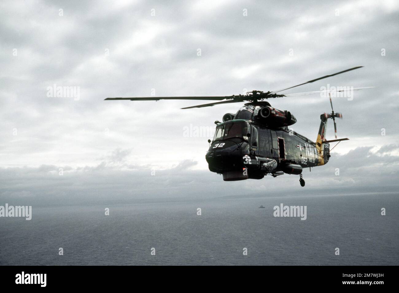 An air-to-air left front view of a Light Helicopter Anti-submarine ...