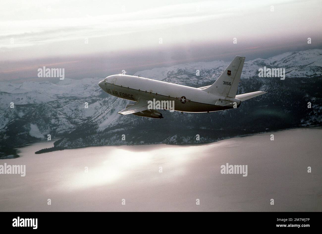 An air-to-air left rear view of a T-43A training aircraft. The T-43A ...