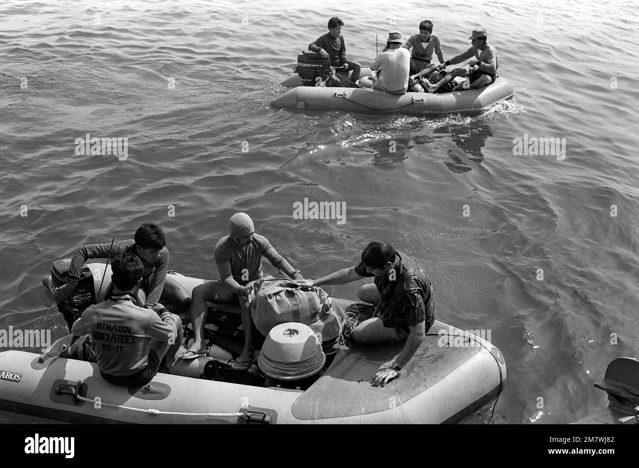 Two rubber rafts, carrying combined Royal Thai navy and U.S. Navy ...