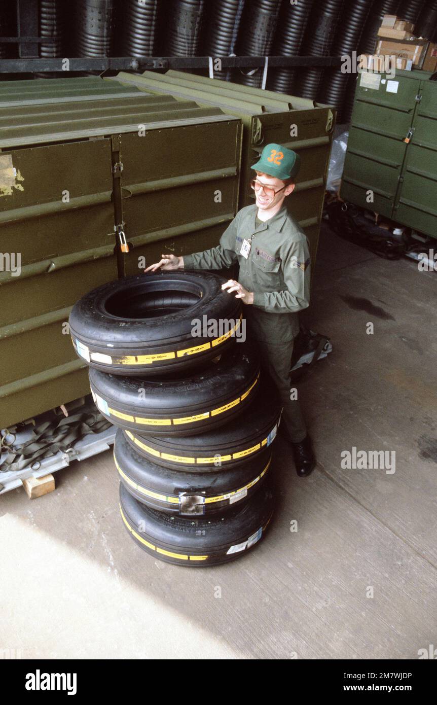 A1C Thomas Cowan delivers F-15 Eagle aircraft tires to the aircraft ...