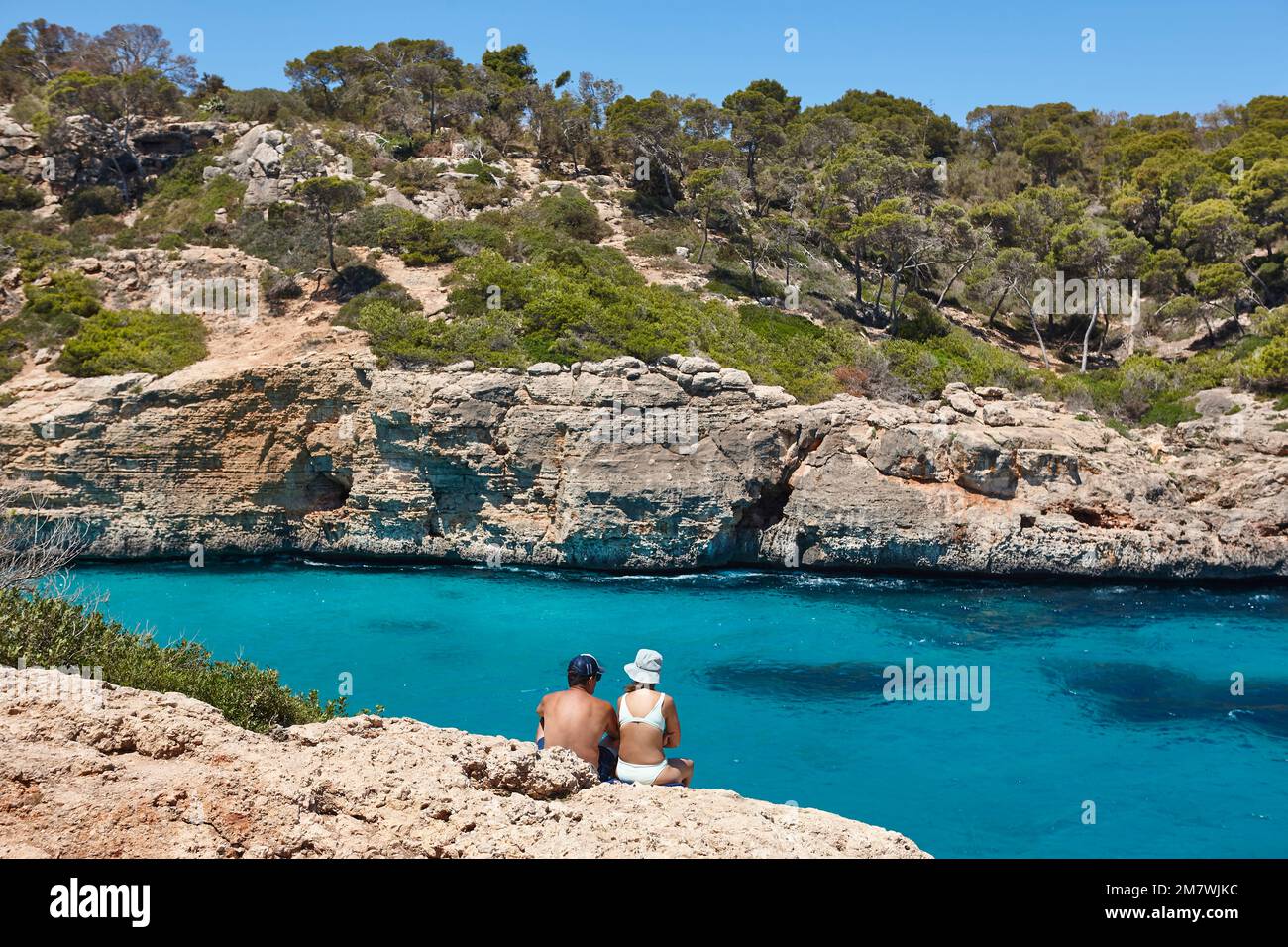 Summer in Spain. Couple enjoying mediterranean turquoise water in ...