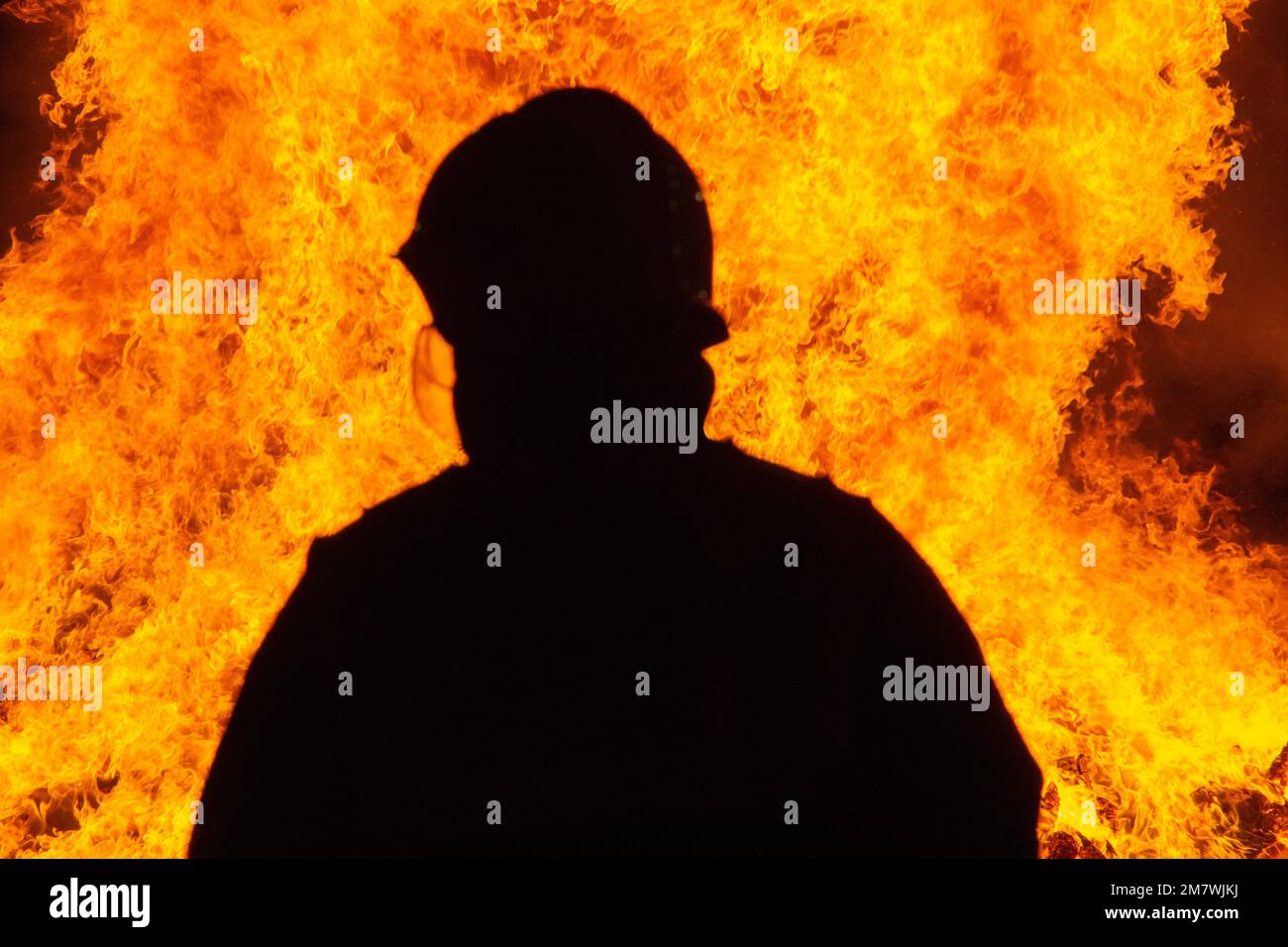 Firefighter putting out house fire hi-res stock photography and images ...