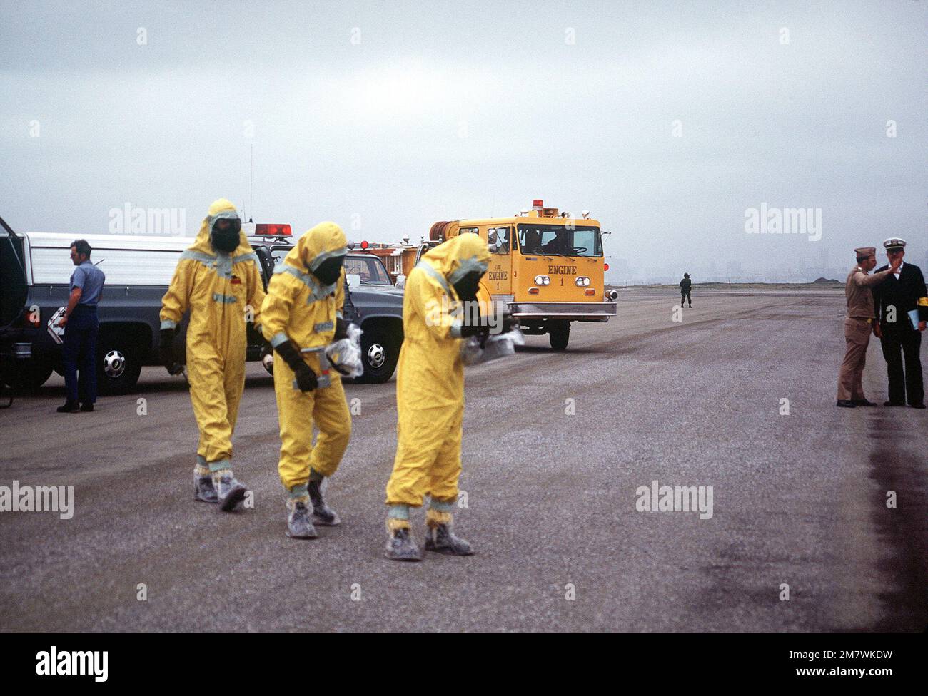 Navy personnel clean up the area during a disaster drill. Base: Naval ...