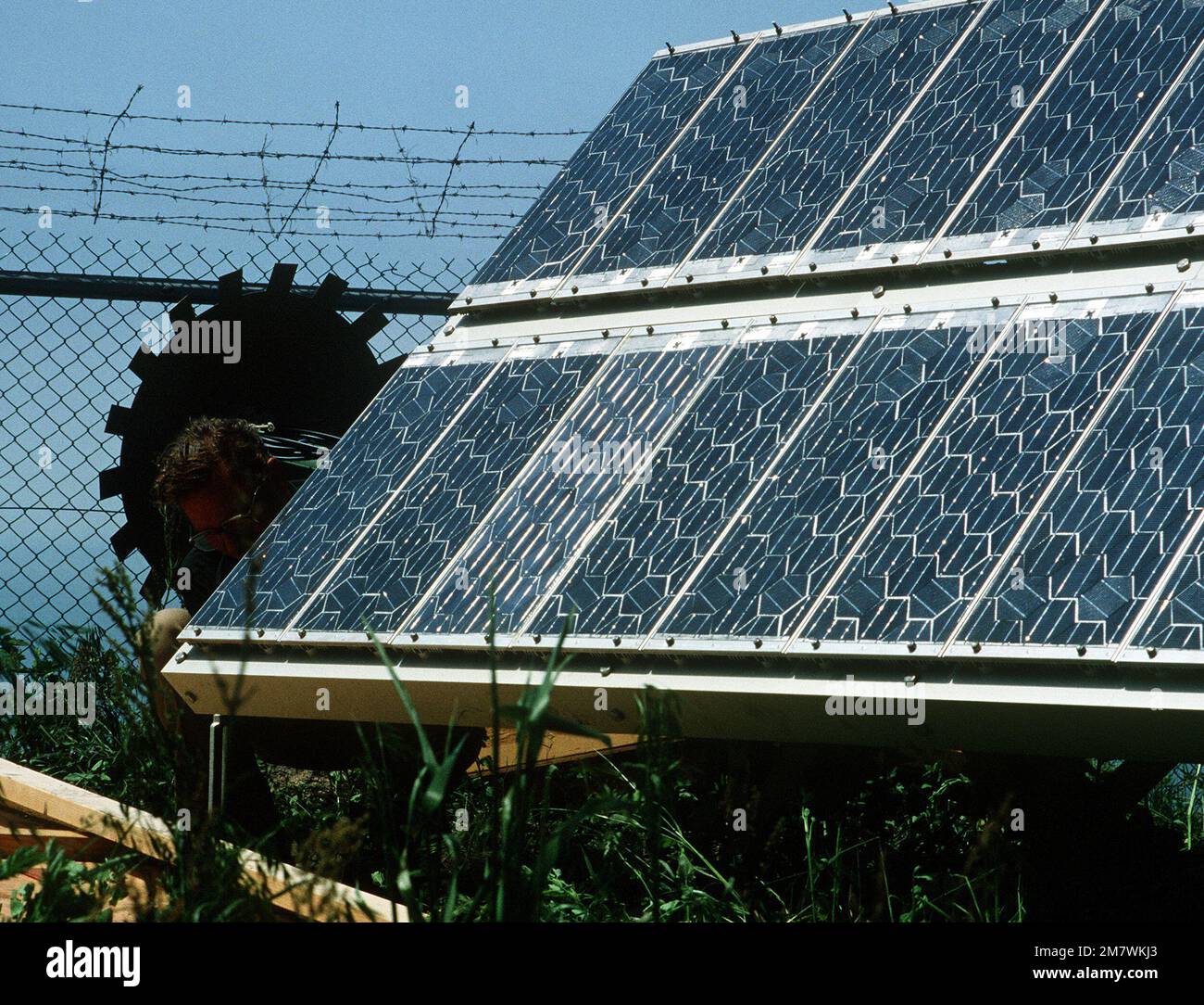A solar panel is secured into position to be used for Commando Triumph ...