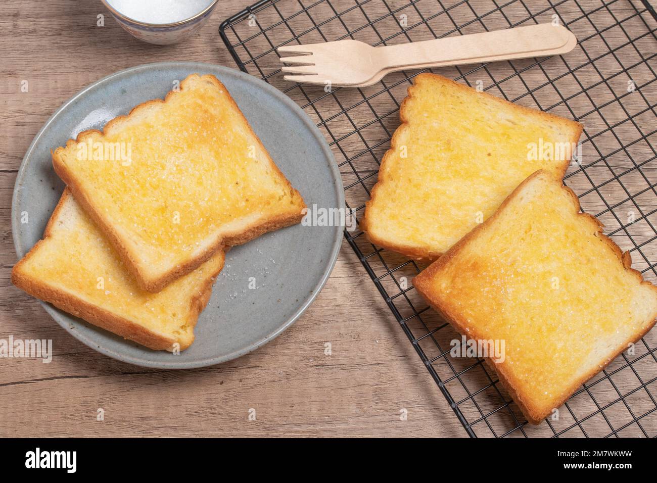 Crispy Toasted Bread with Butter and Sugar Stock Photo - Alamy