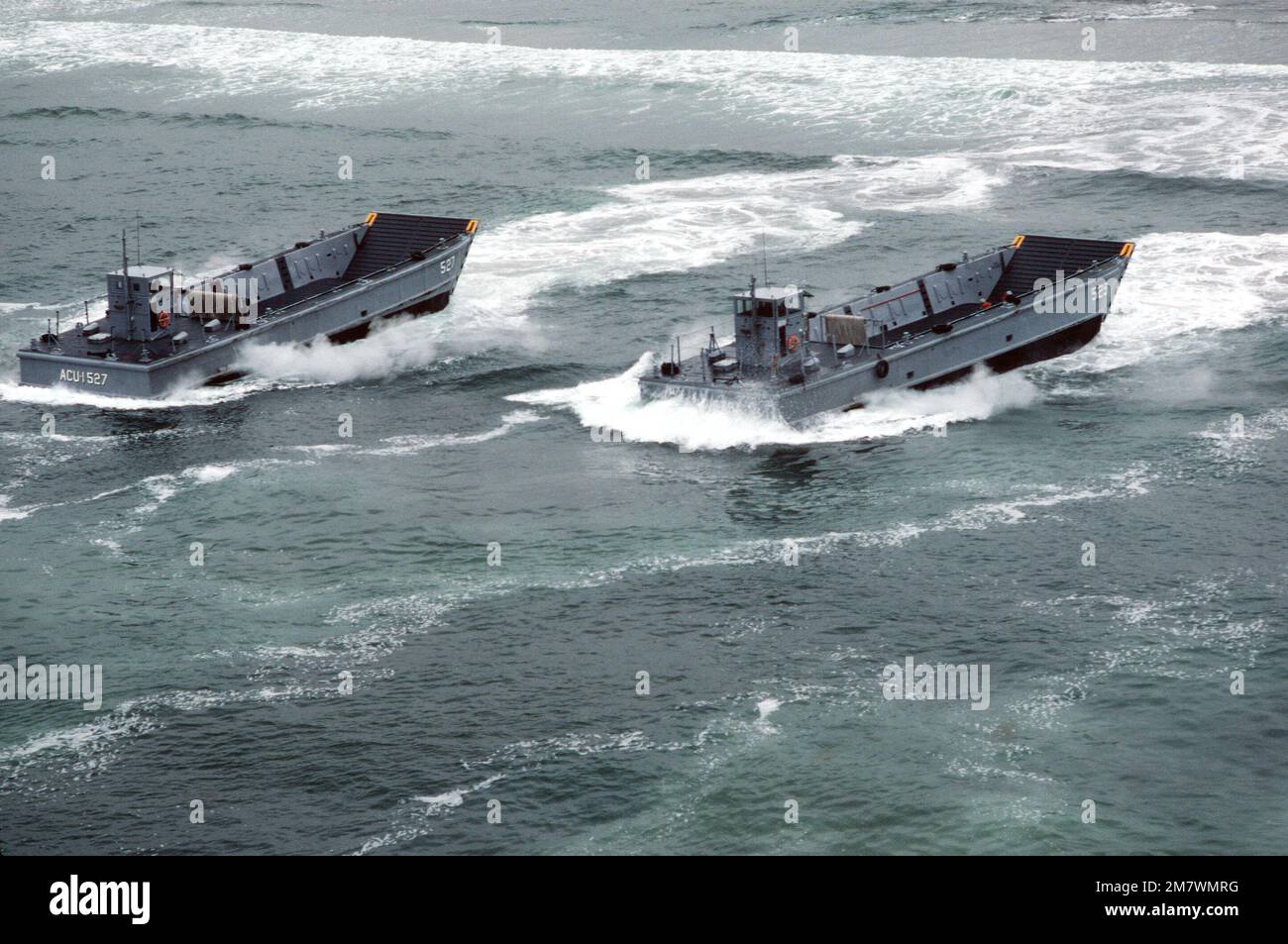 An aerial starboard quarter view of the mechanized landing craft (LCM ...