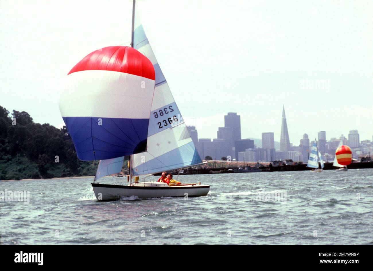 Three sail boats take part in the Treasure Island Yacht Club sailing ...