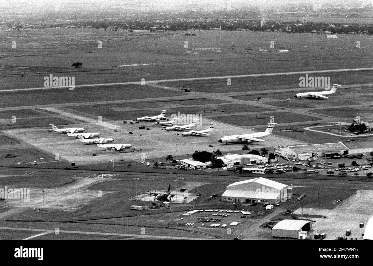 An aerial view of various aircraft parked on the flight line. Base ...