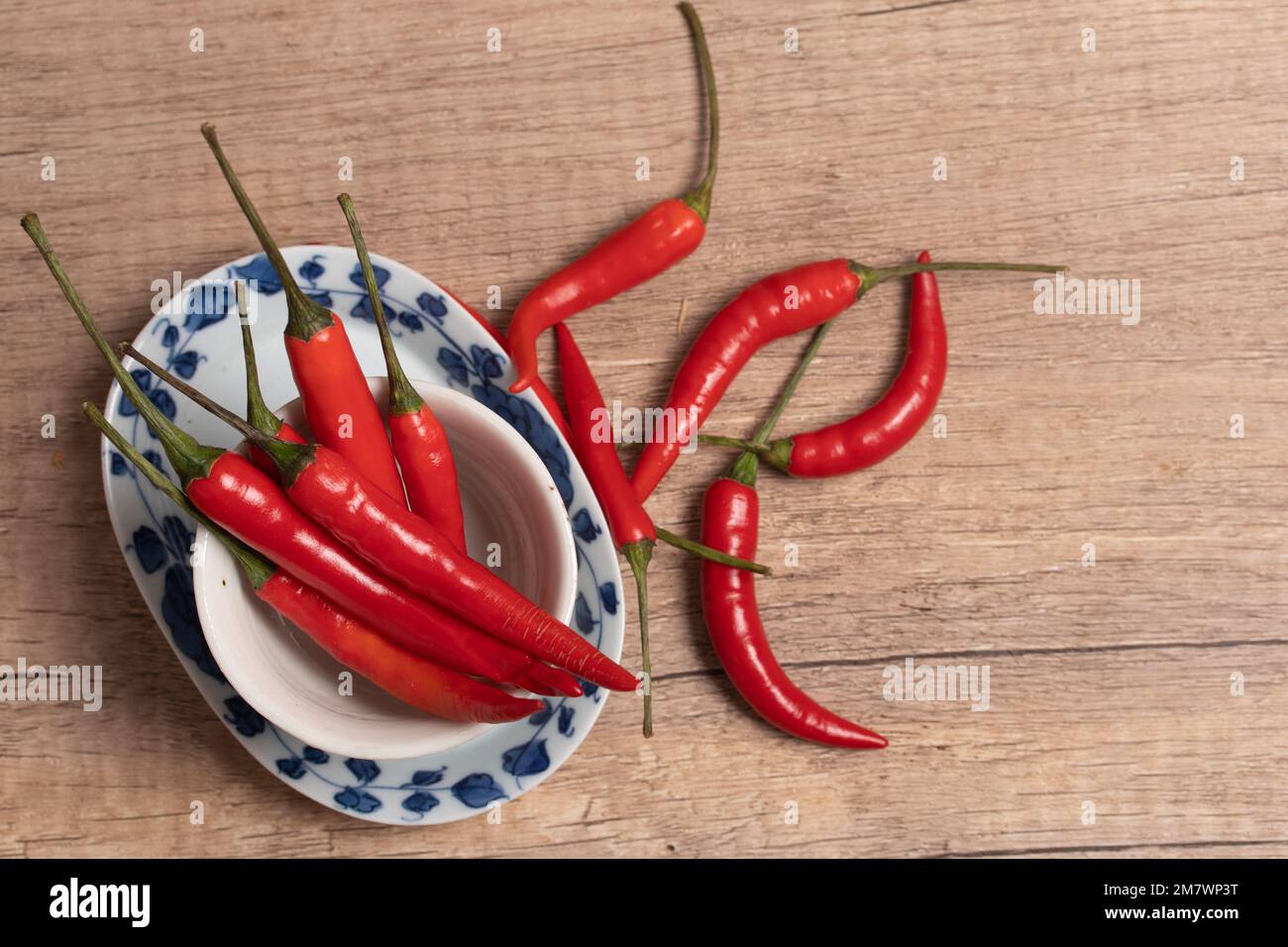 Chili peppers in cup hi-res stock photography and images - Alamy