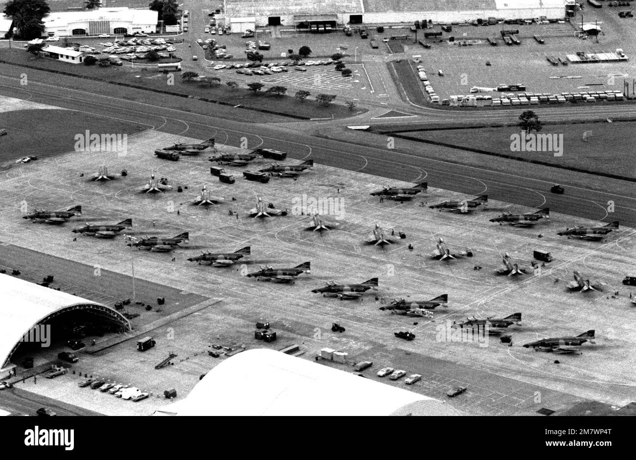 An aerial view of F-4 Phantom aircraft parked on the flight line. Base ...
