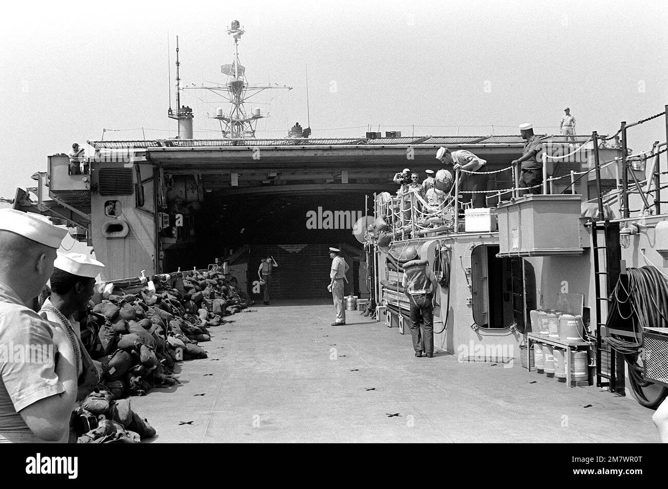 A utility landing craft departs the docking well of the amphibious ...
