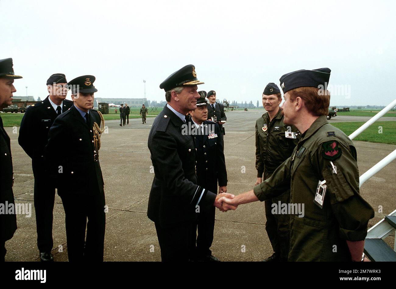Air View Marshall Clark shakes hands with CPT Mark Devane of the 183rd ...