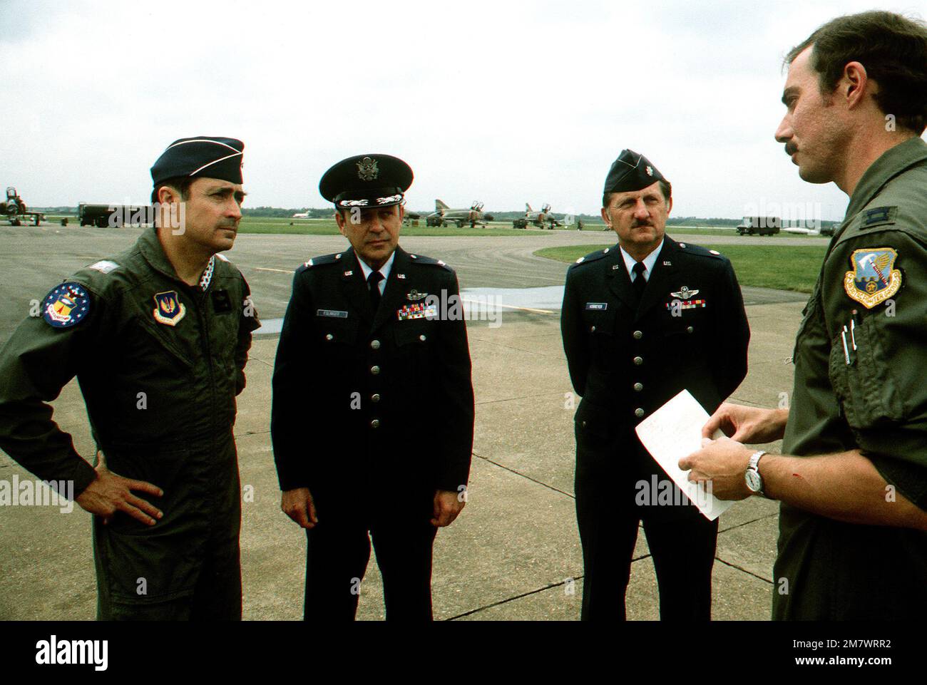BGEN Joseph Moore, left, talks with members of the 183rd Tactical ...