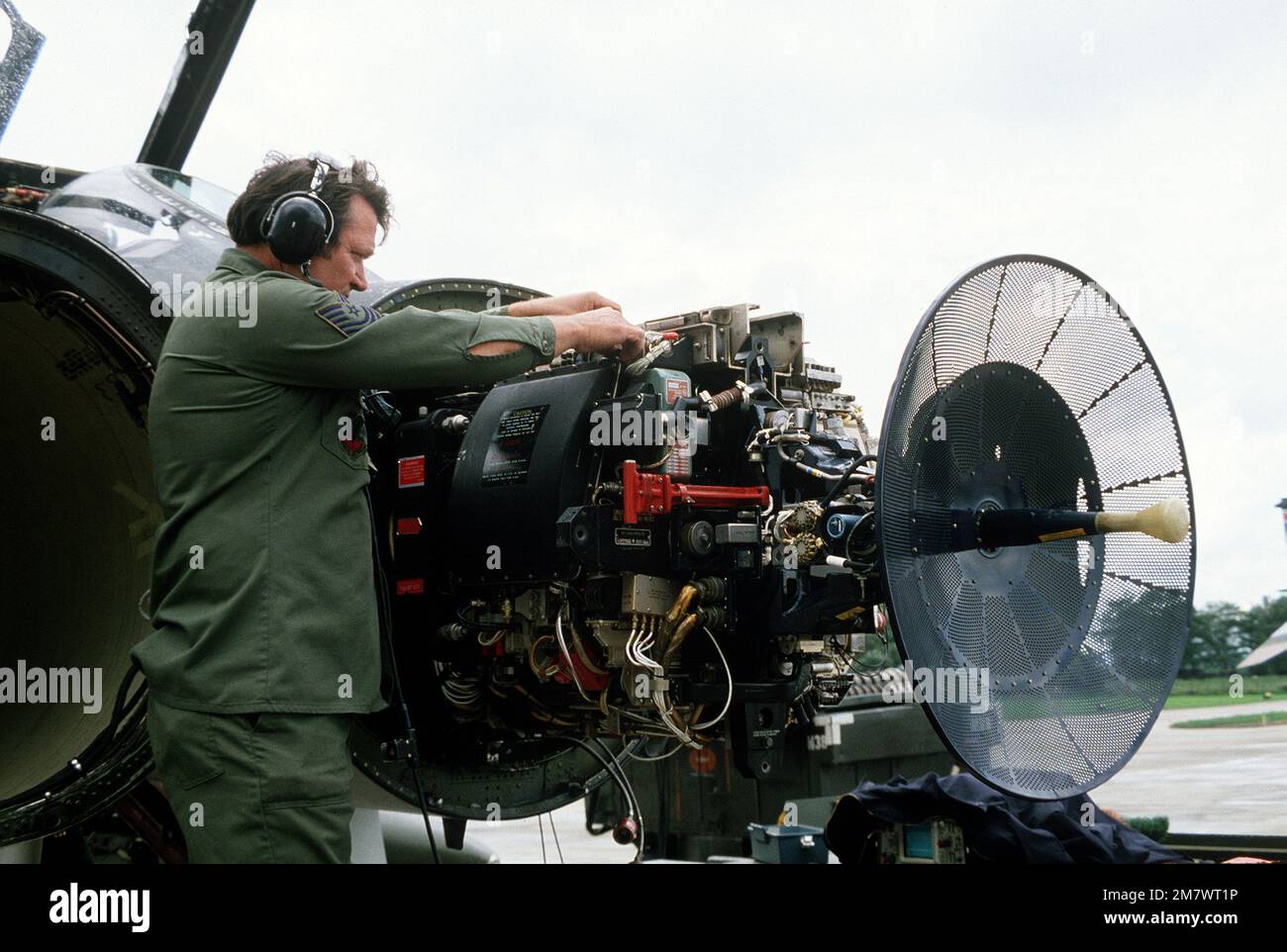 MSGT James F. Stewart, weapons control technician, performs maintenance ...